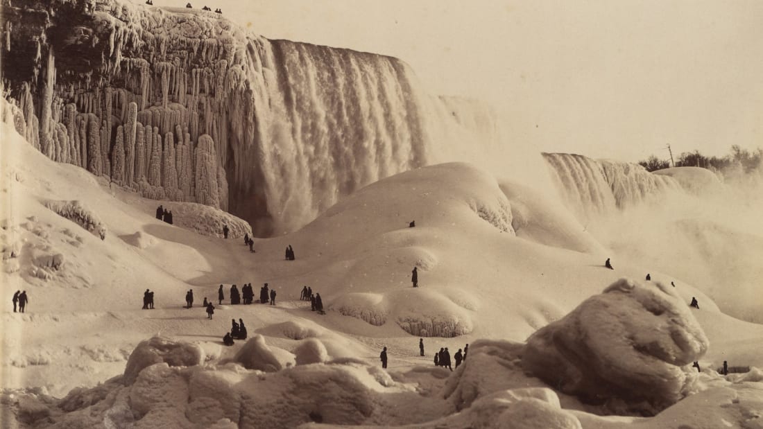 See Historical Photos of Tourists Gathering on the Ice Bridge Beneath ...