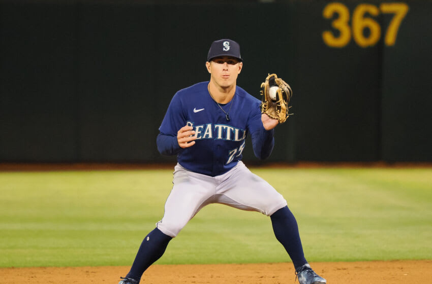 Why did the Seattle Mariners just give Dylan Moore $8.895 million?