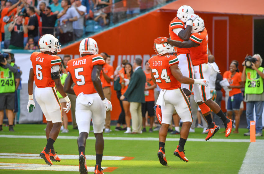 New strength and conditioning coach David Feeley setting Miami ...