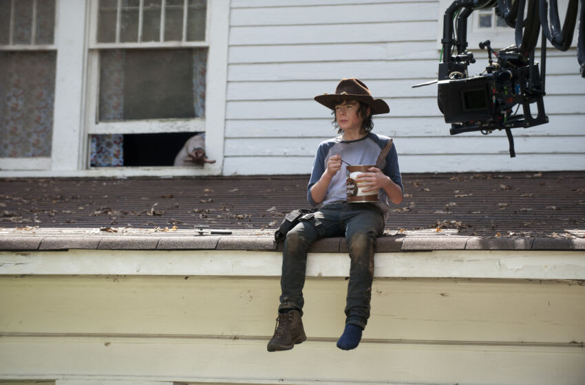 When does Carl die in The Walking Dead?